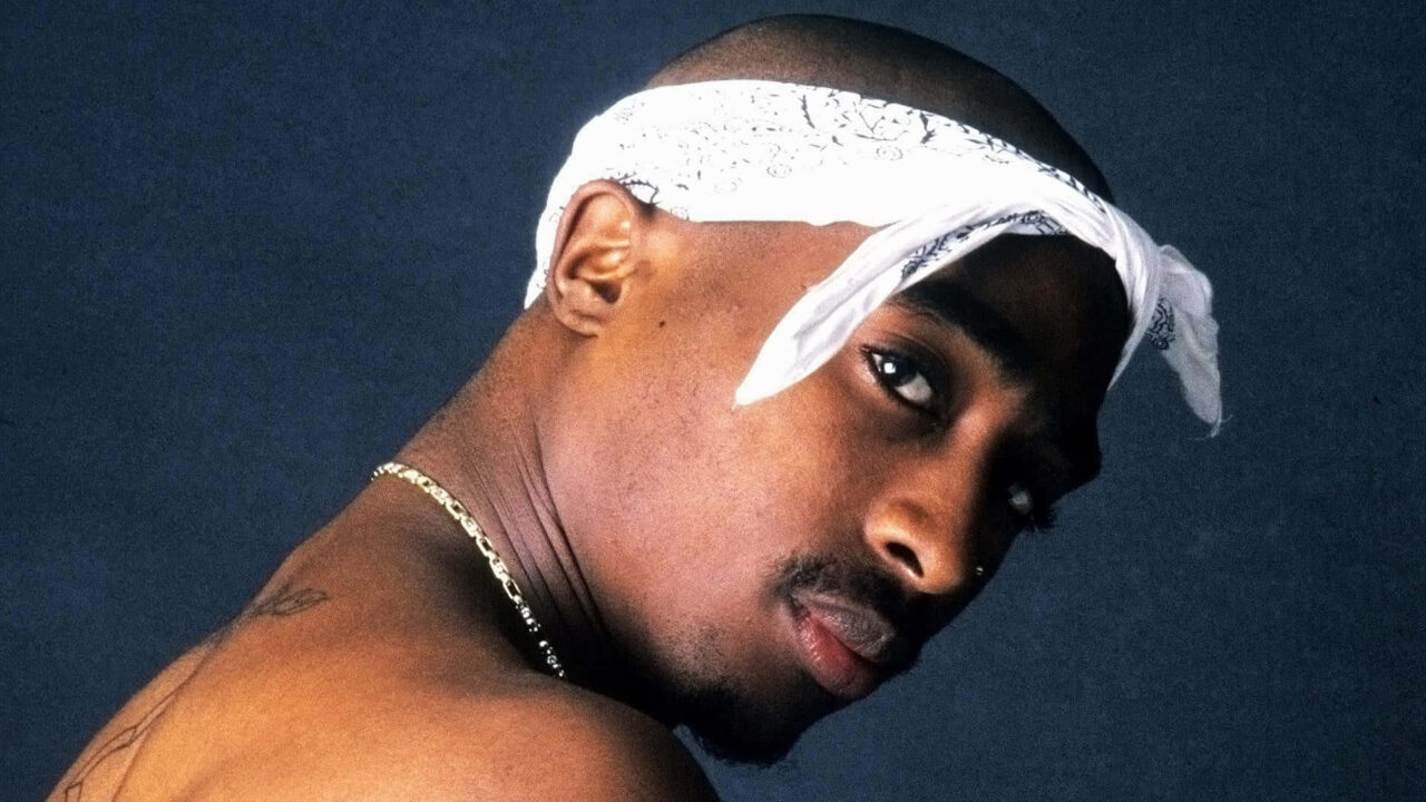 Intense Gaze of 2Pac in Close-Up Portrait Wallpaper | Background FREE ...