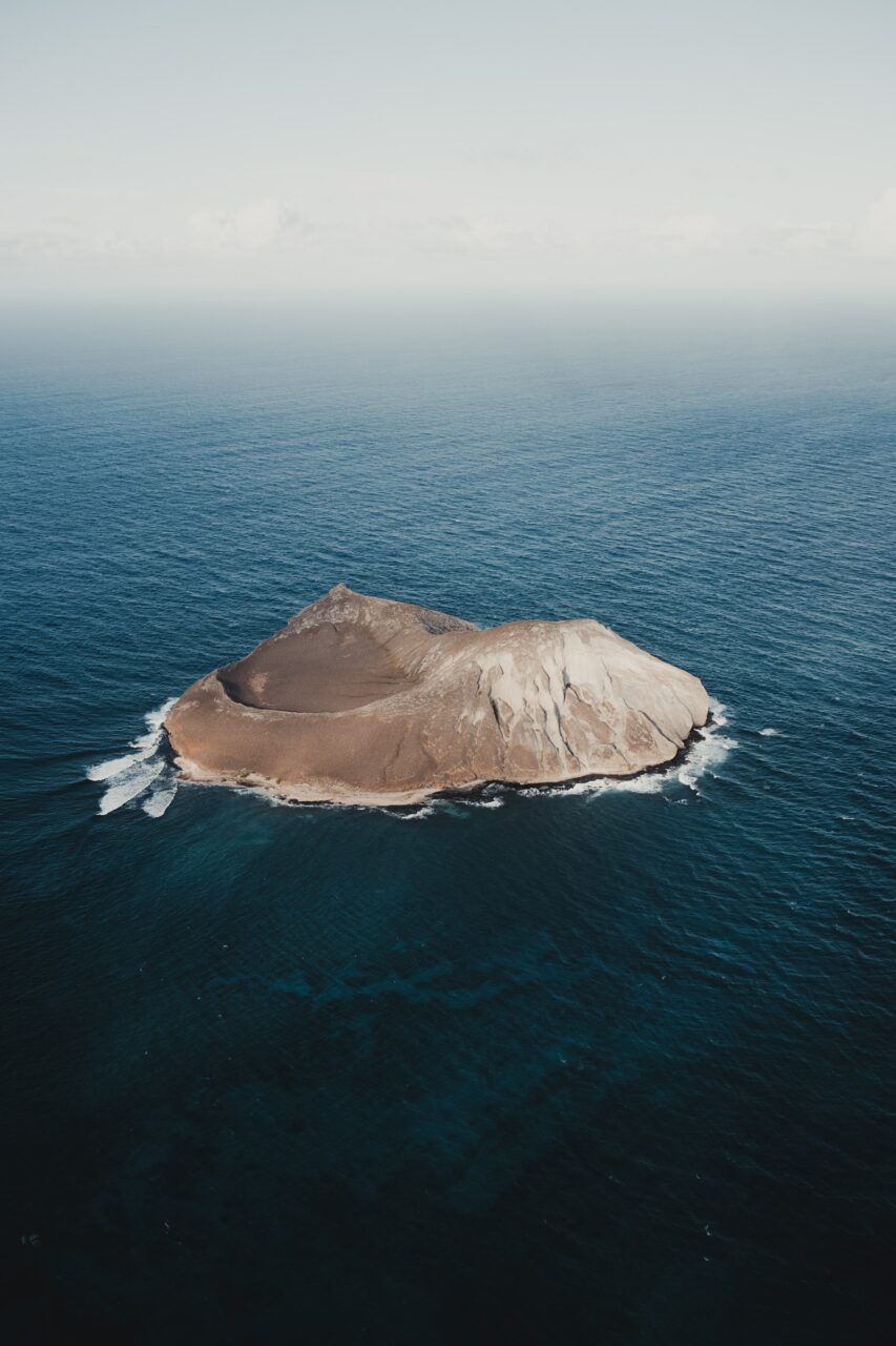 Aerial View Rugged Island in Blue Sea Wallpaper | Background FREE ...