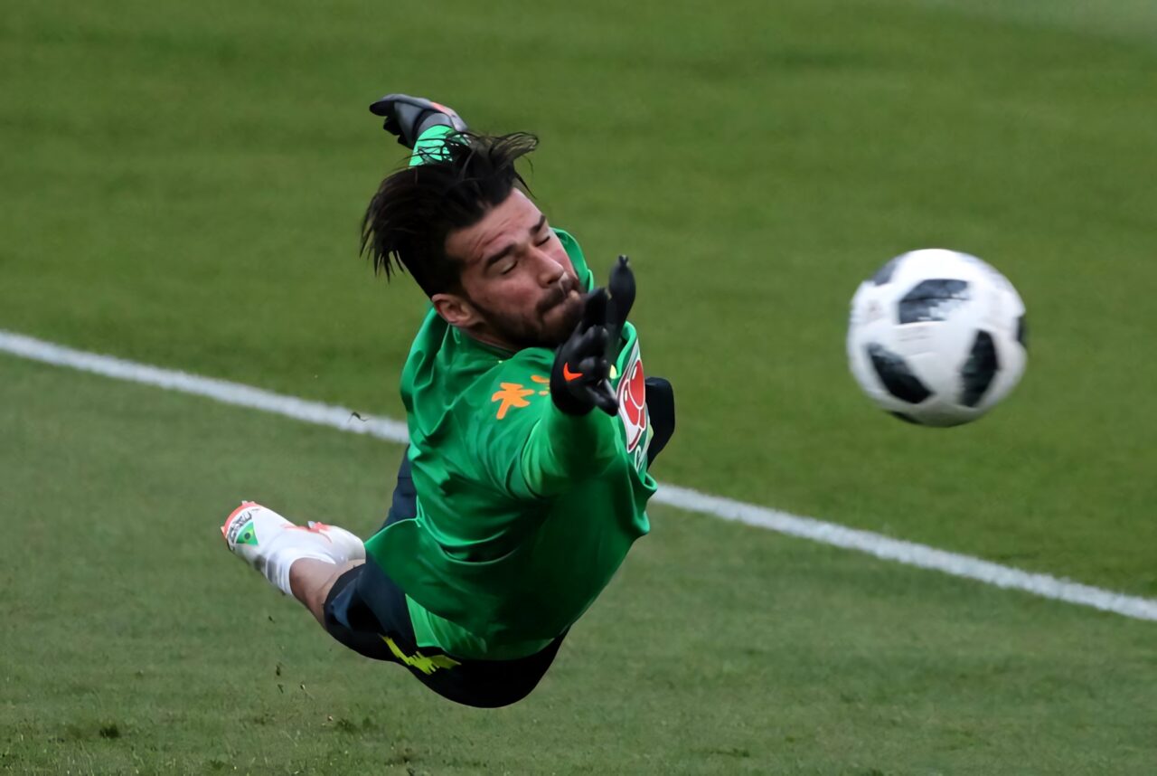 Alisson Becker Mid-Air Save in Green Kit Soccer Wallpaper | Background ...