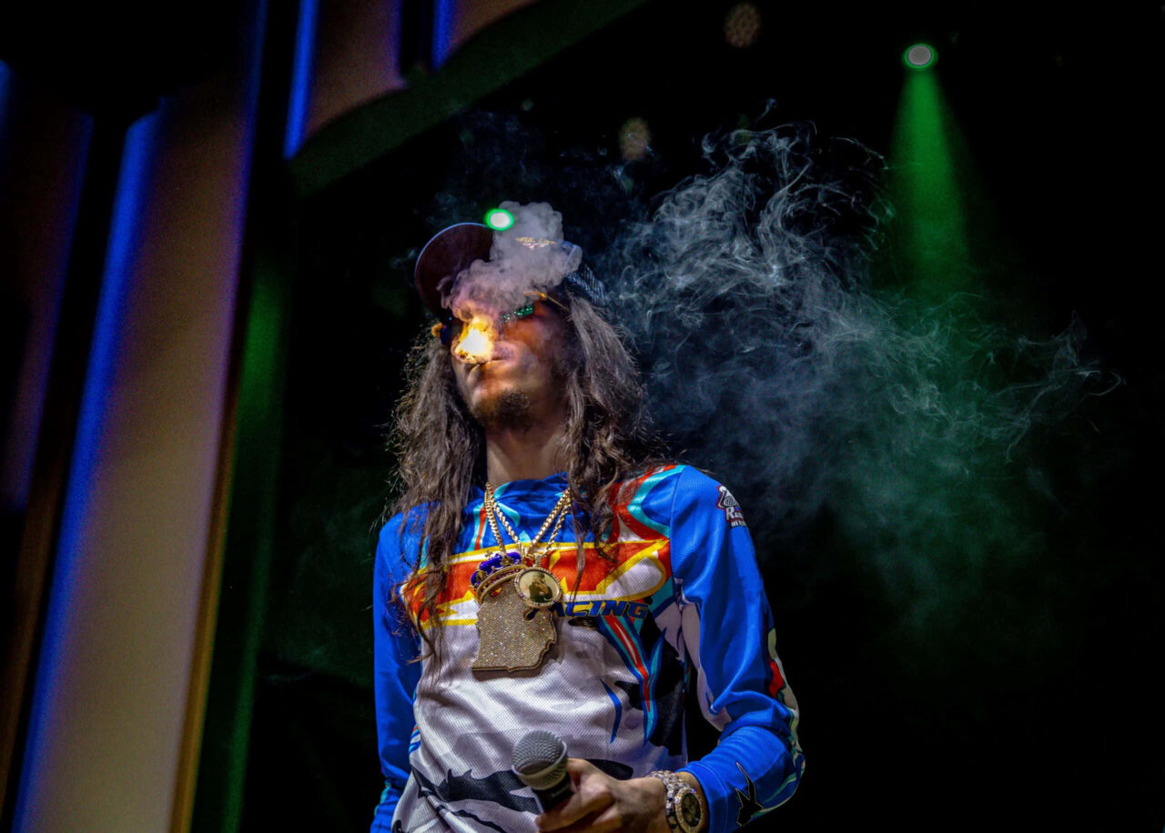 BabyTron On Stage Vibrant Outfit Smoke Effects Wallpaper | Background ...