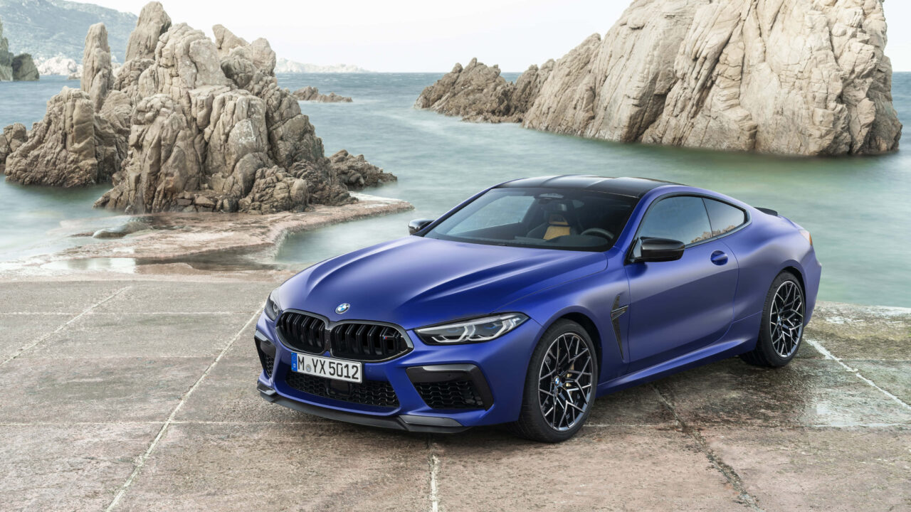 Blue BMW M8 Sports Car on Stunning Sea Background Wallpaper | FREE ...