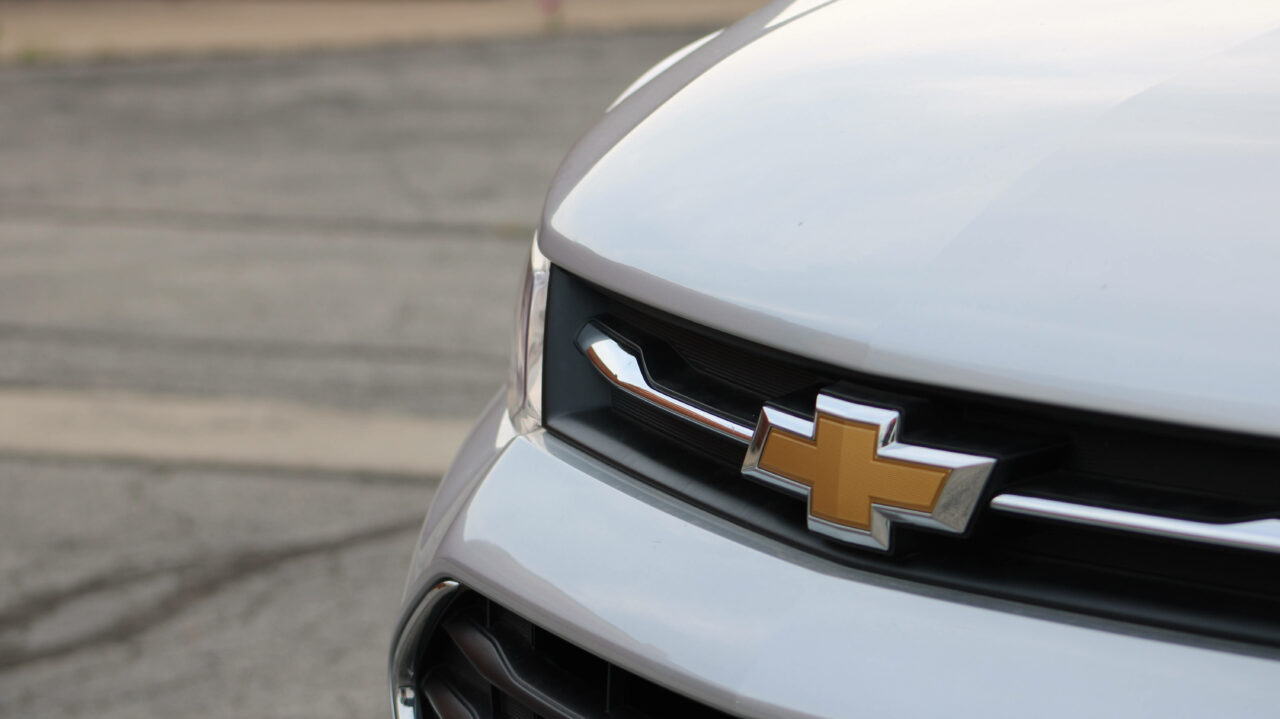 Bold Camaro Grille Under Sunny Skies Wallpaper | Background FREE ...
