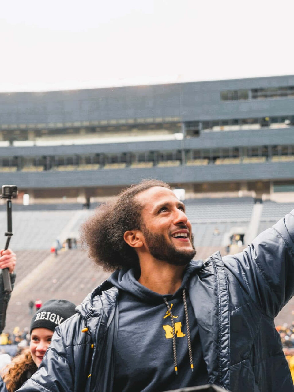 Colin Kaepernick Smiling with Fans in Hoodie Stadium Wallpaper ...