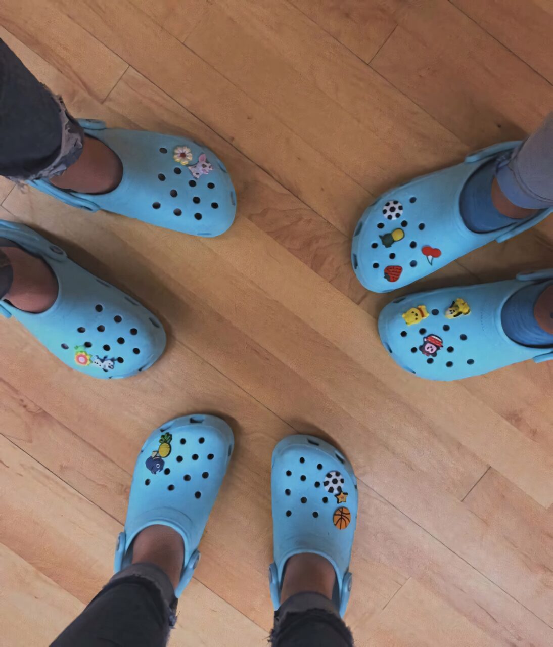 Colorful Blue Crocs with Charms Celebrating Style Wallpaper ...