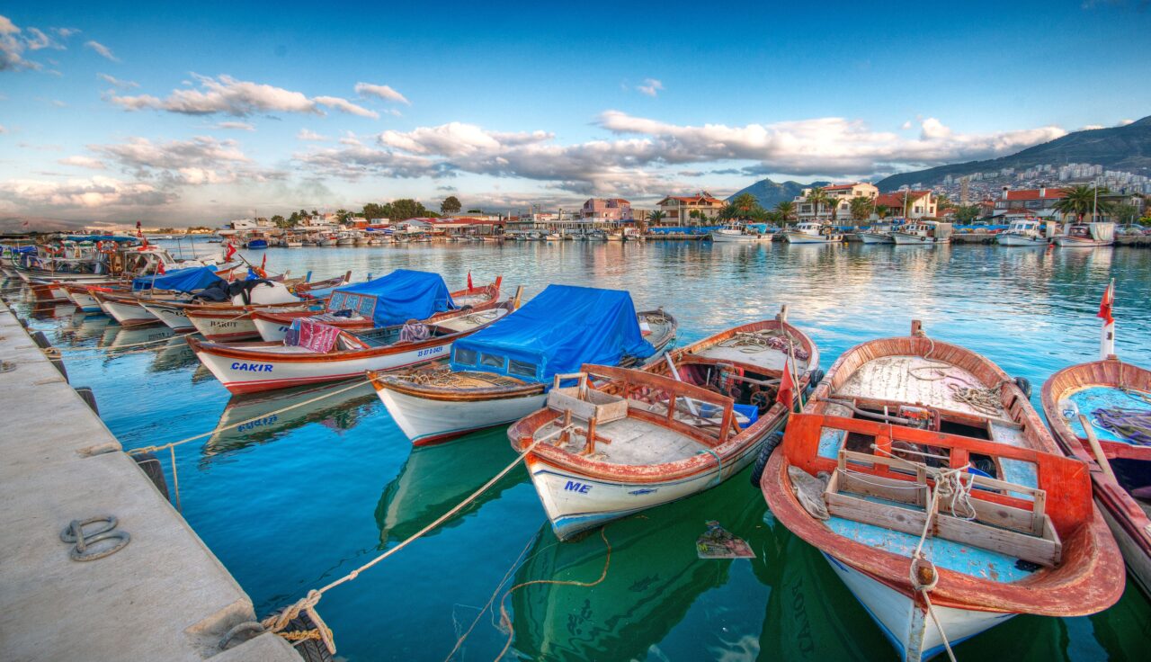 Colorful Coastal Dock with Boats and Mountains Wallpaper | Background ...