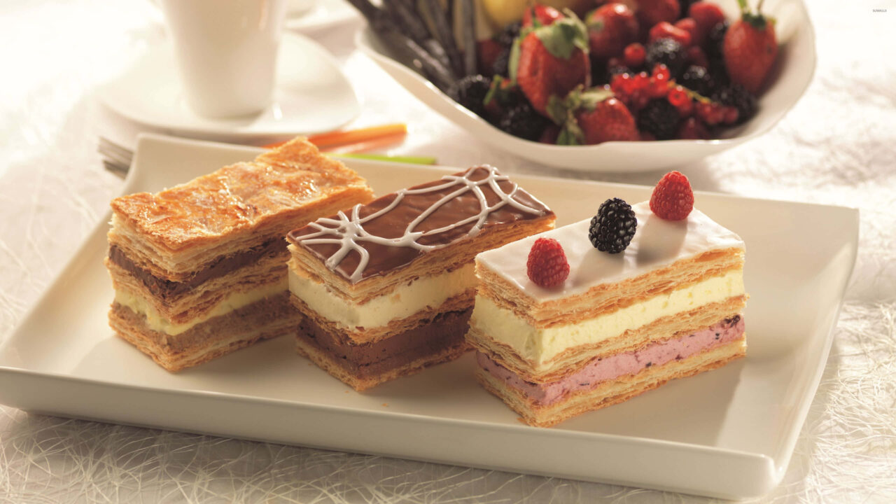 Layered Mille-Feuille Cake Trio with Fruit Garnishes Wallpaper ...