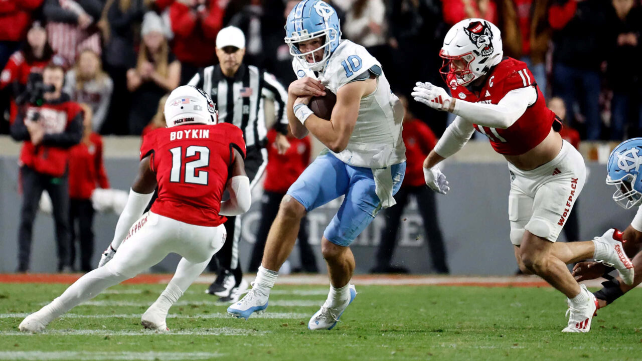Drake Maye's Bold Run vs NC State Defenders Football Wallpaper ...