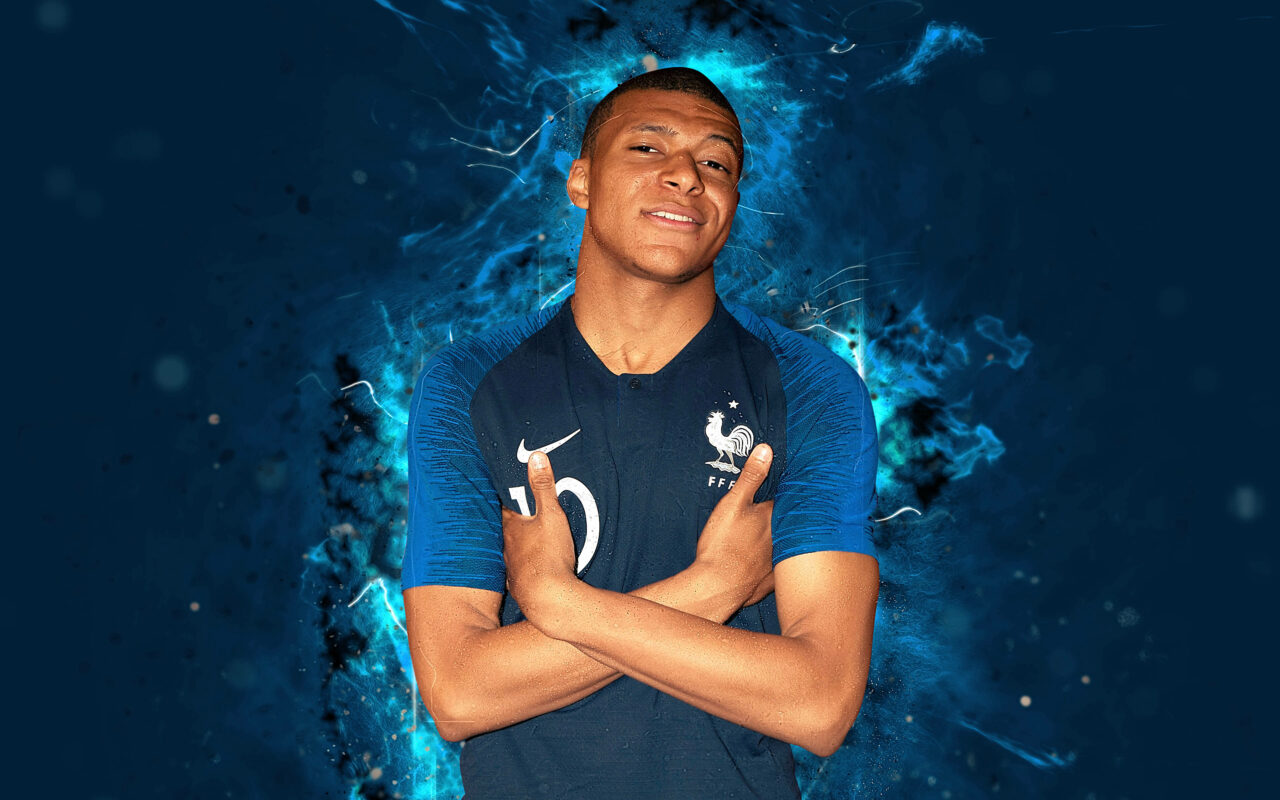 Kylian Mbappe in Action with Vibrant Energy Wallpaper | Background FREE ...