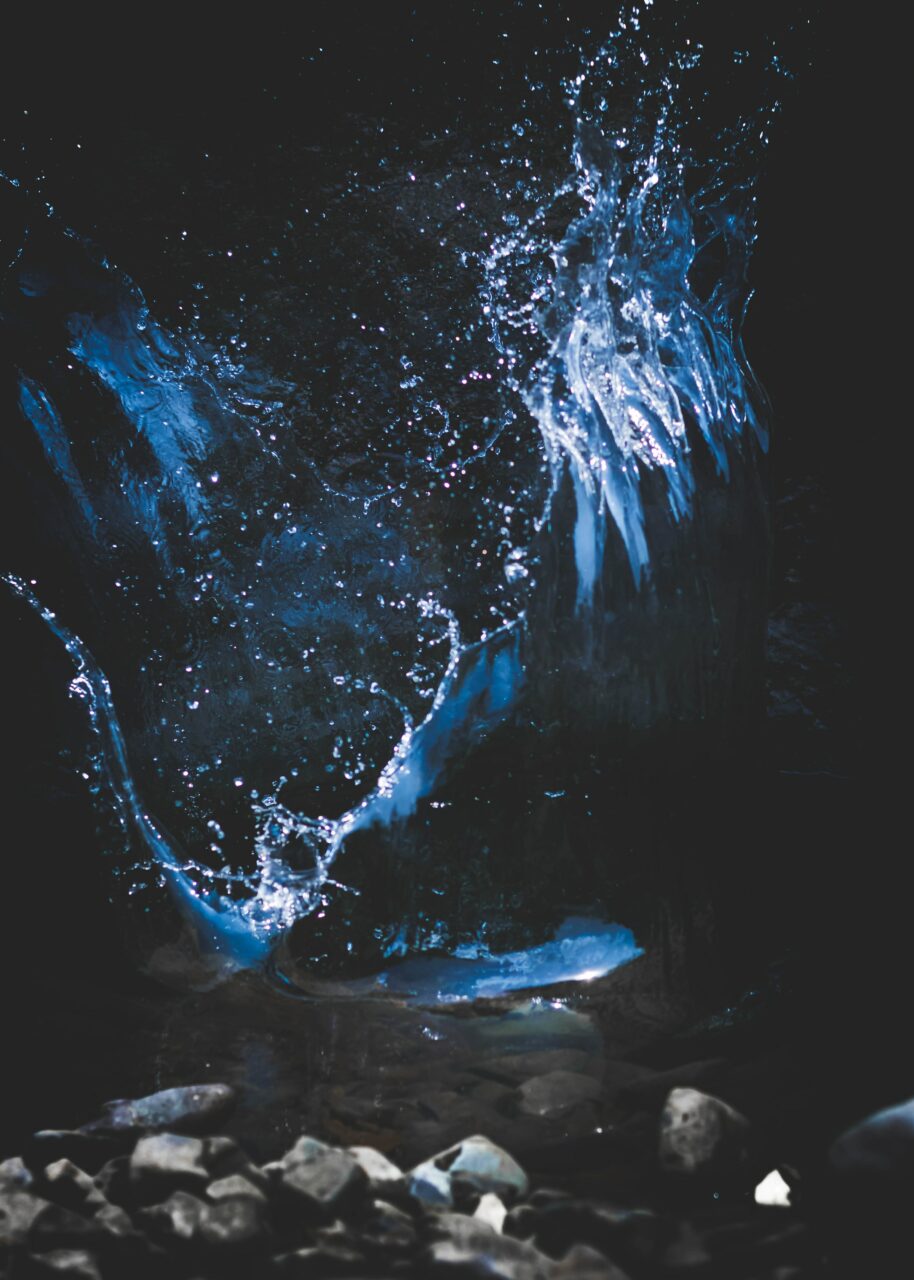 Dynamic Water Splashing Against Dark Background Wallpaper | FREE ...