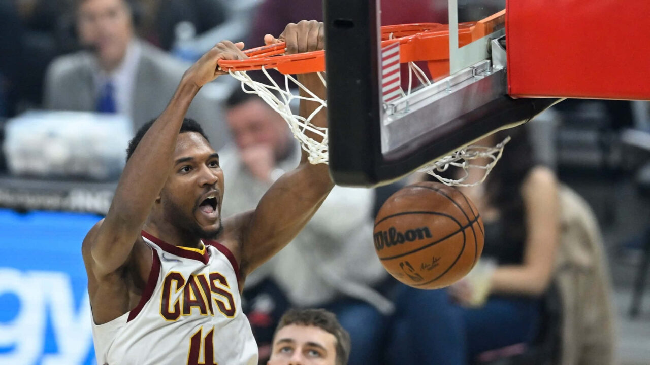 Evan Mobley Powerful Dunk Cleveland Cavaliers Wallpaper | Background ...