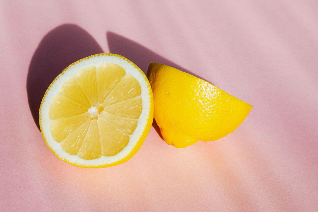 Zesty Lemon Glow on Pastel Pink Wallpaper | Background FREE Download ...