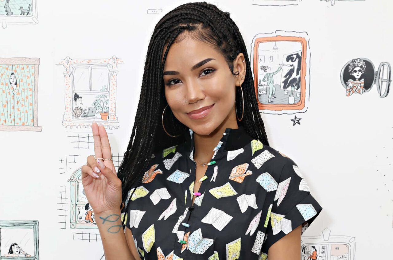 Jhené Aiko Confident Pose and Charm Artistic Style Wallpaper ...