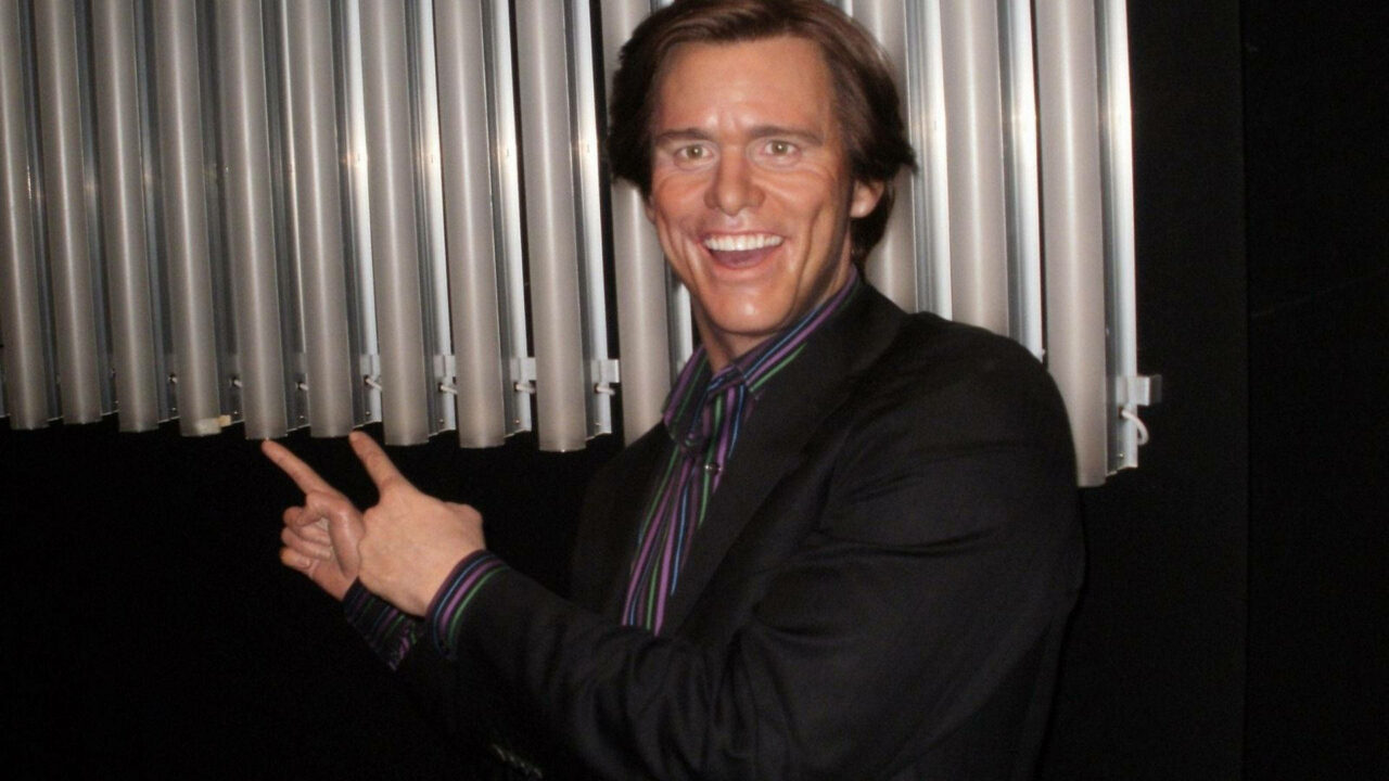 Jim Carrey Smiling Brightly in Suit Charismatic Wallpaper | Background ...