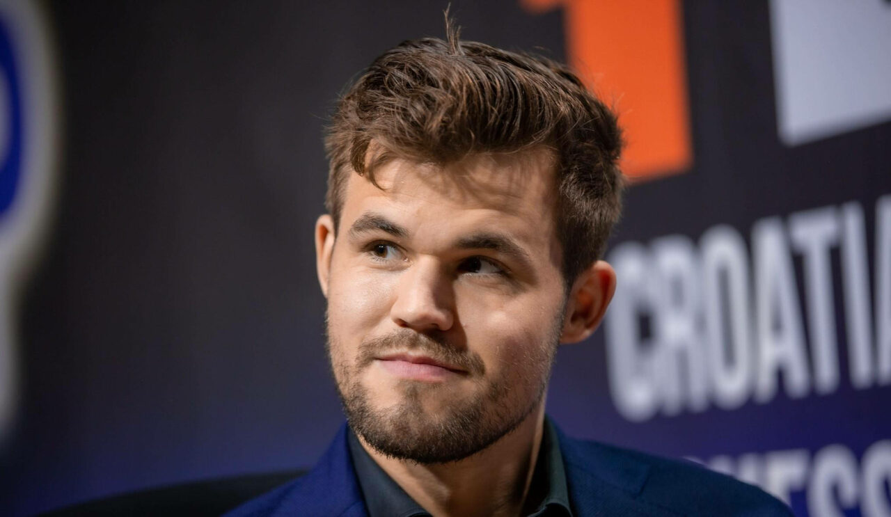 Charismatic Magnus Carlsen Smiling Wallpaper | Background FREE Download ...