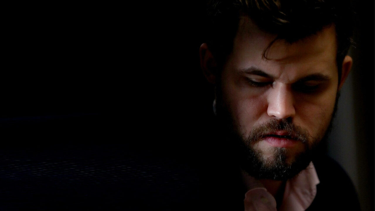Intense Focus of Chess Master Magnus Carlsen Wallpaper | Background ...