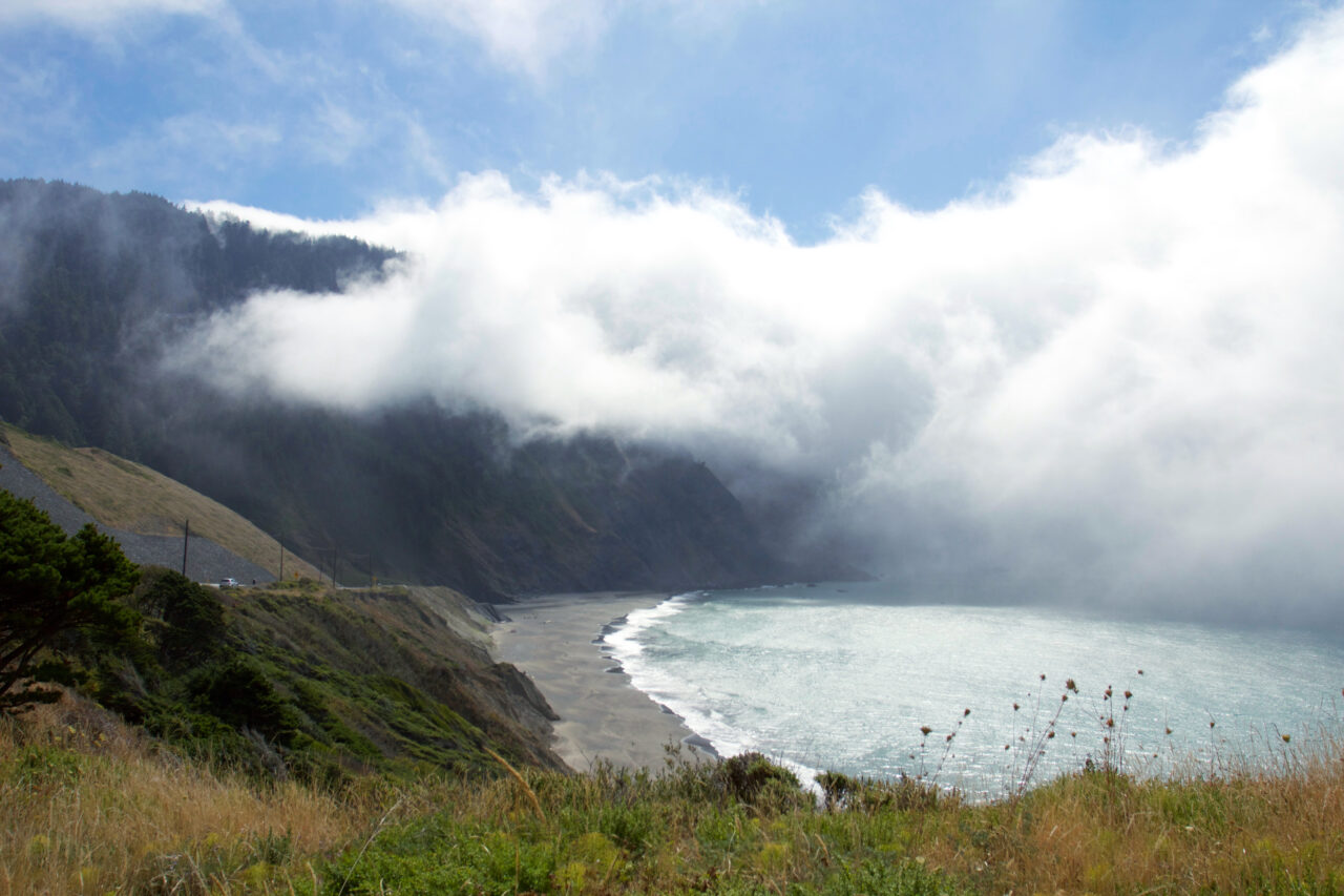 Misty Mountain Shoreline with Foggy Cliffs Coastal Wallpaper ...