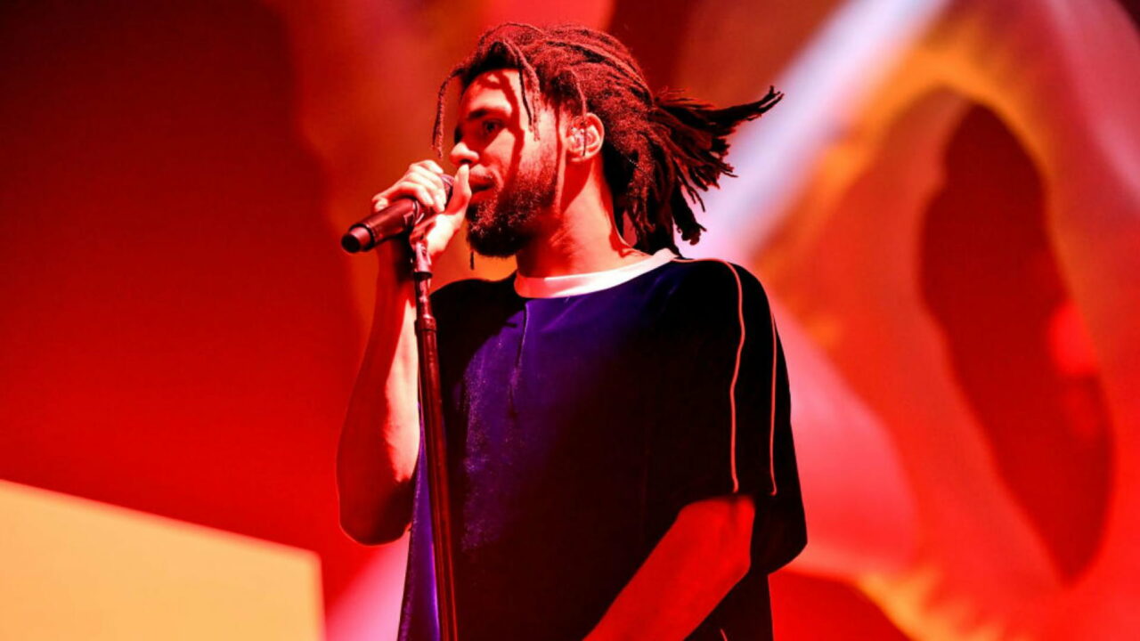Confident Rapper J Cole in Vibrant HD Wallpaper | Background FREE ...