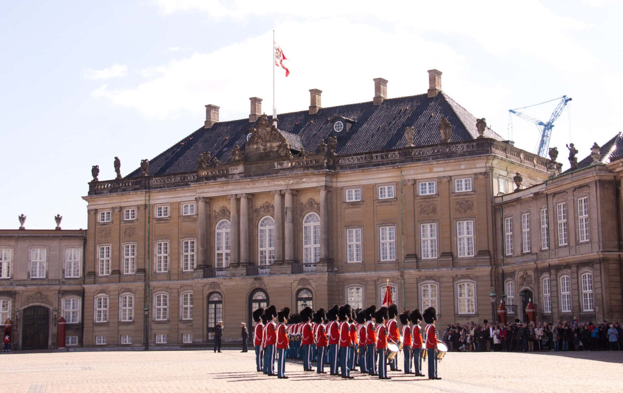 Royal Guards in Red Uniforms at Amalienborg Palace Wallpaper ...