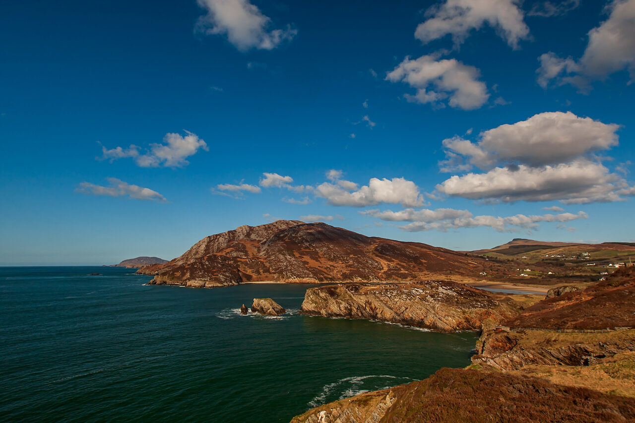 Rugged Coastal Cliffs and Blue Sea Scenic Wallpaper | Background FREE ...