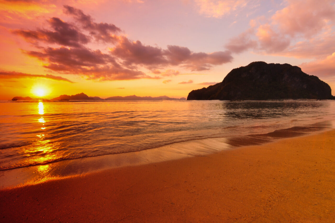 Serene Sunset Coastal Beach with Island Silhouette Wallpaper ...