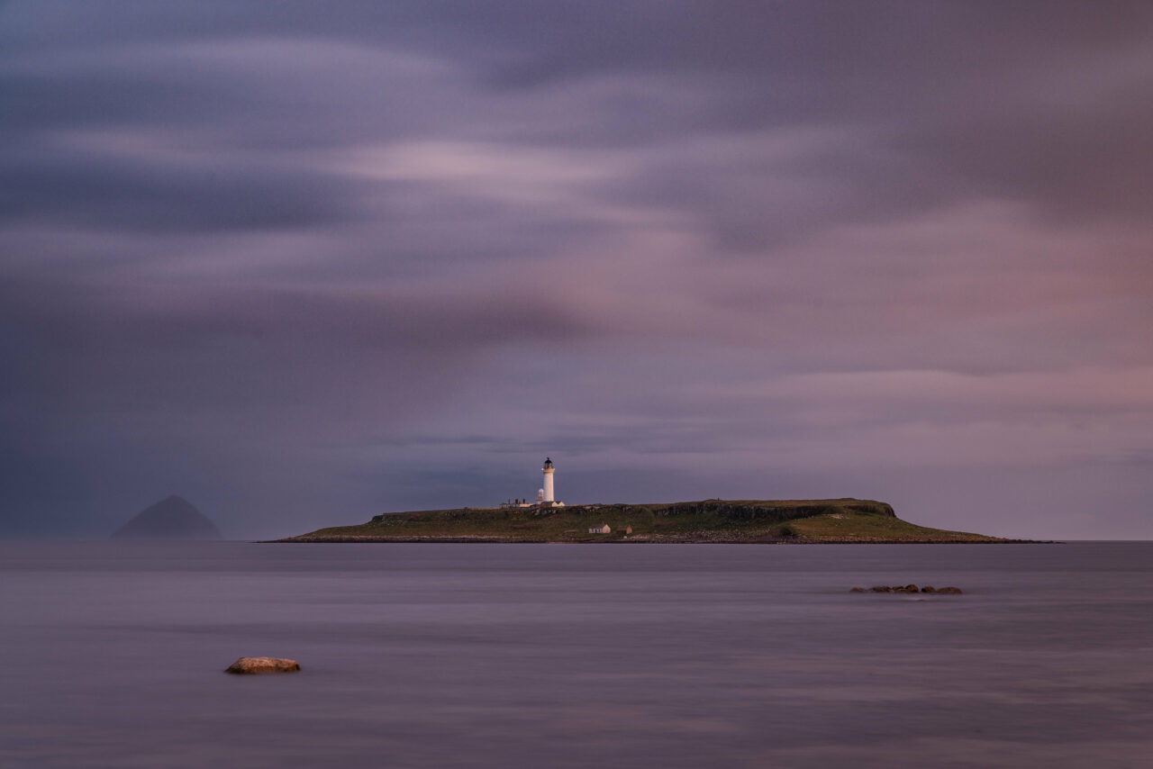 Serene Lighthouse on Calm Sea Island Natural Beauty Wallpaper ...