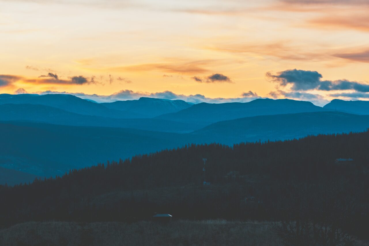 Serene Evening Mountain Landscape with Blue Hills Wallpaper ...