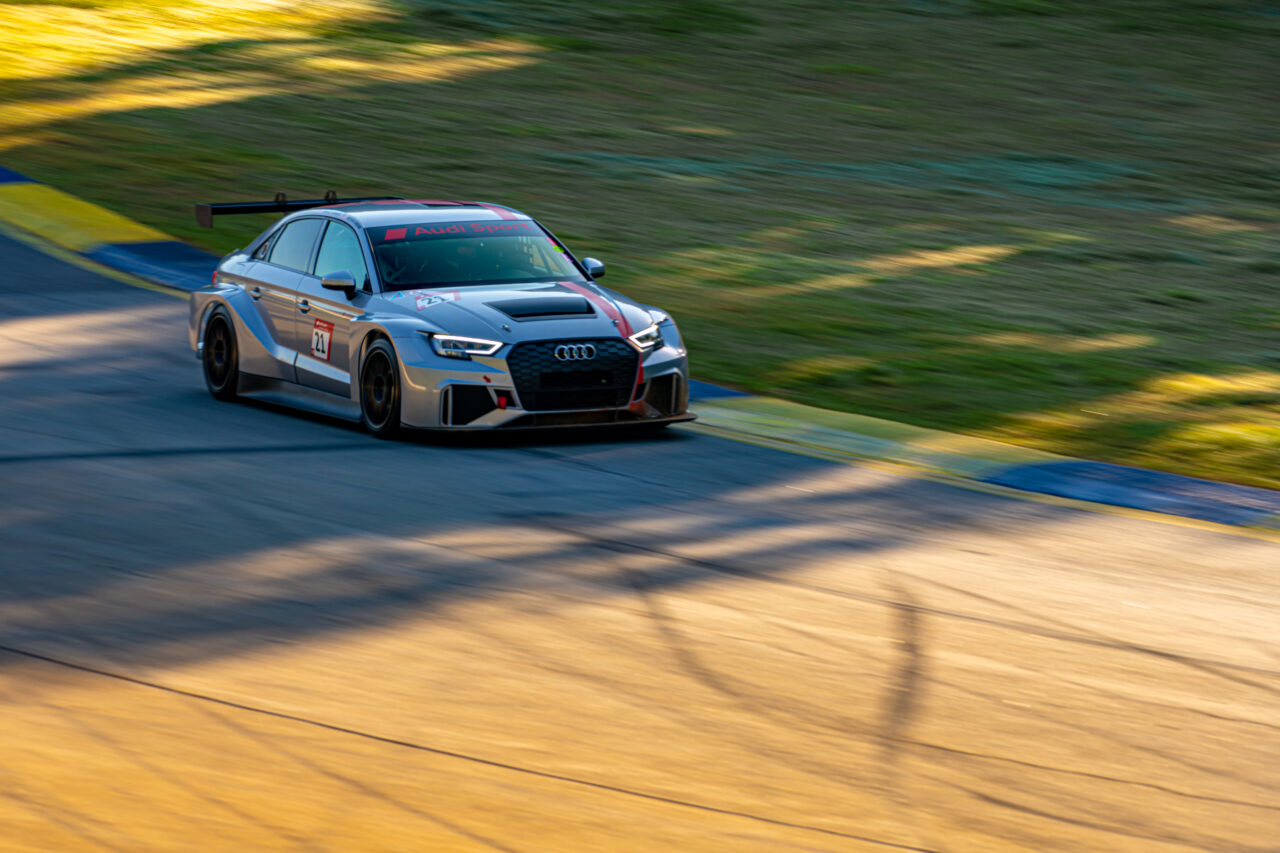 Sleek Audi Racing Car in Motion Wallpaper | Background FREE Download ...