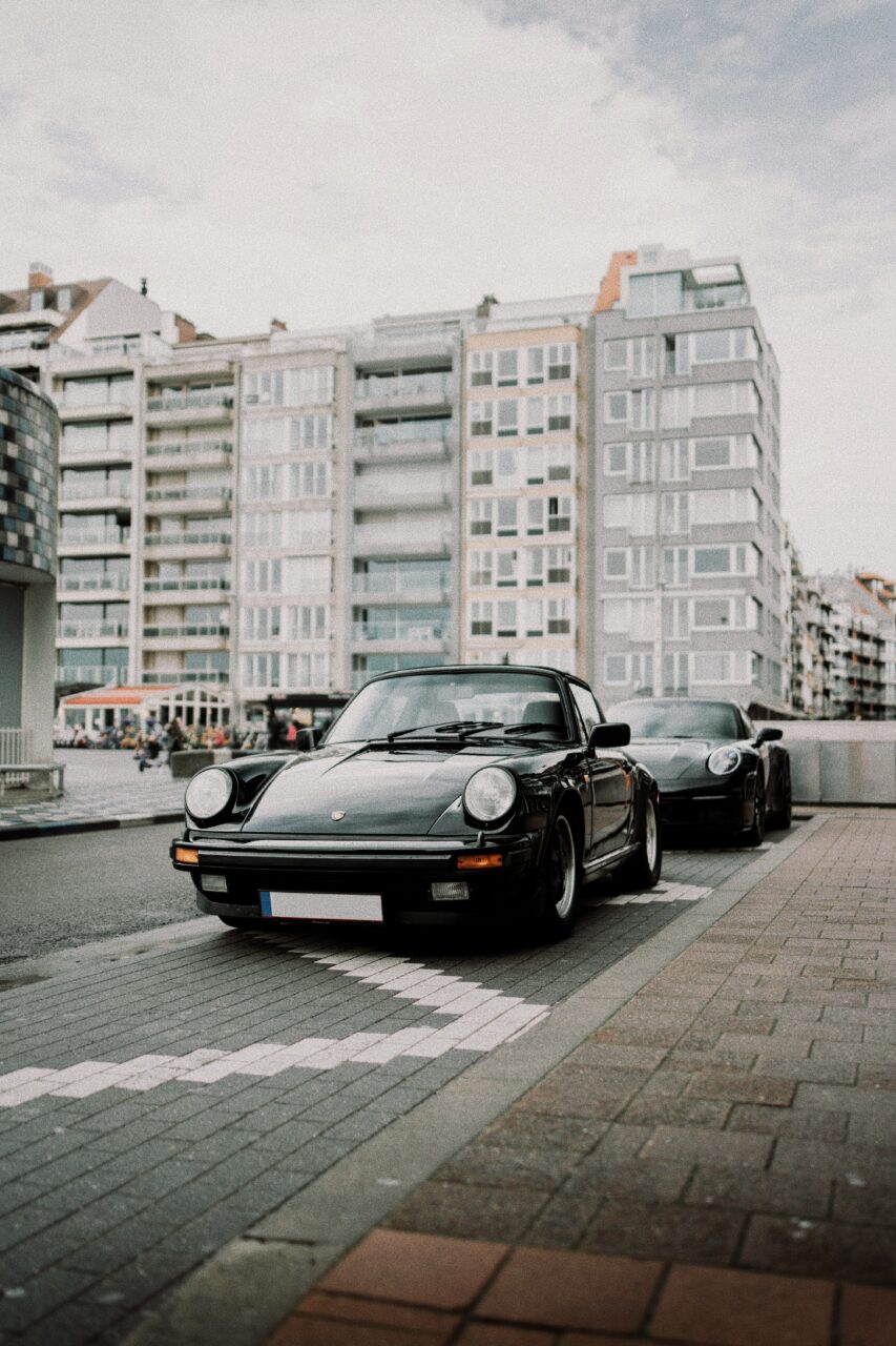 Sleek Black Porsche 911 Urban Wallpaper | Background FREE Download ...
