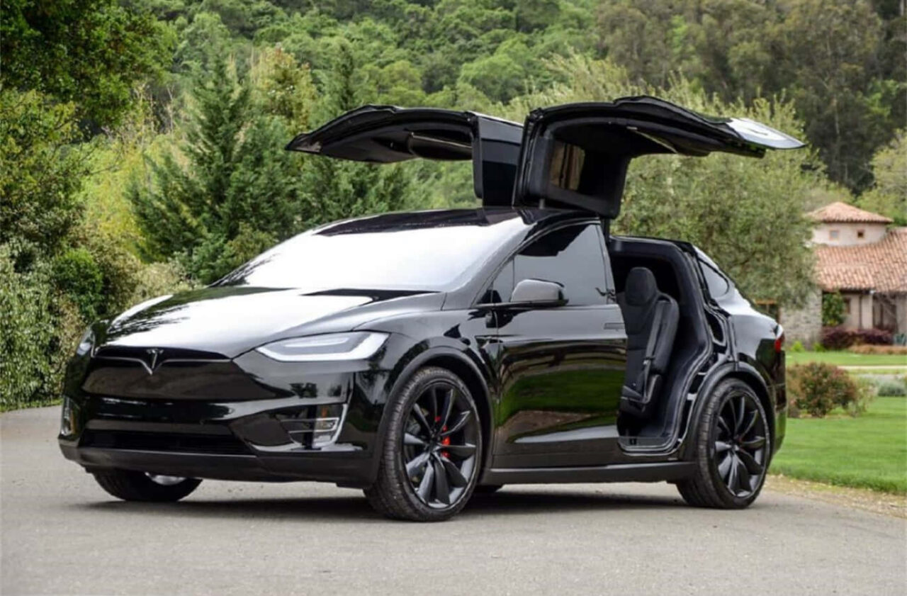 Sleek Black Tesla Falcon-Wing Doors Luxury Wallpaper | Background FREE ...