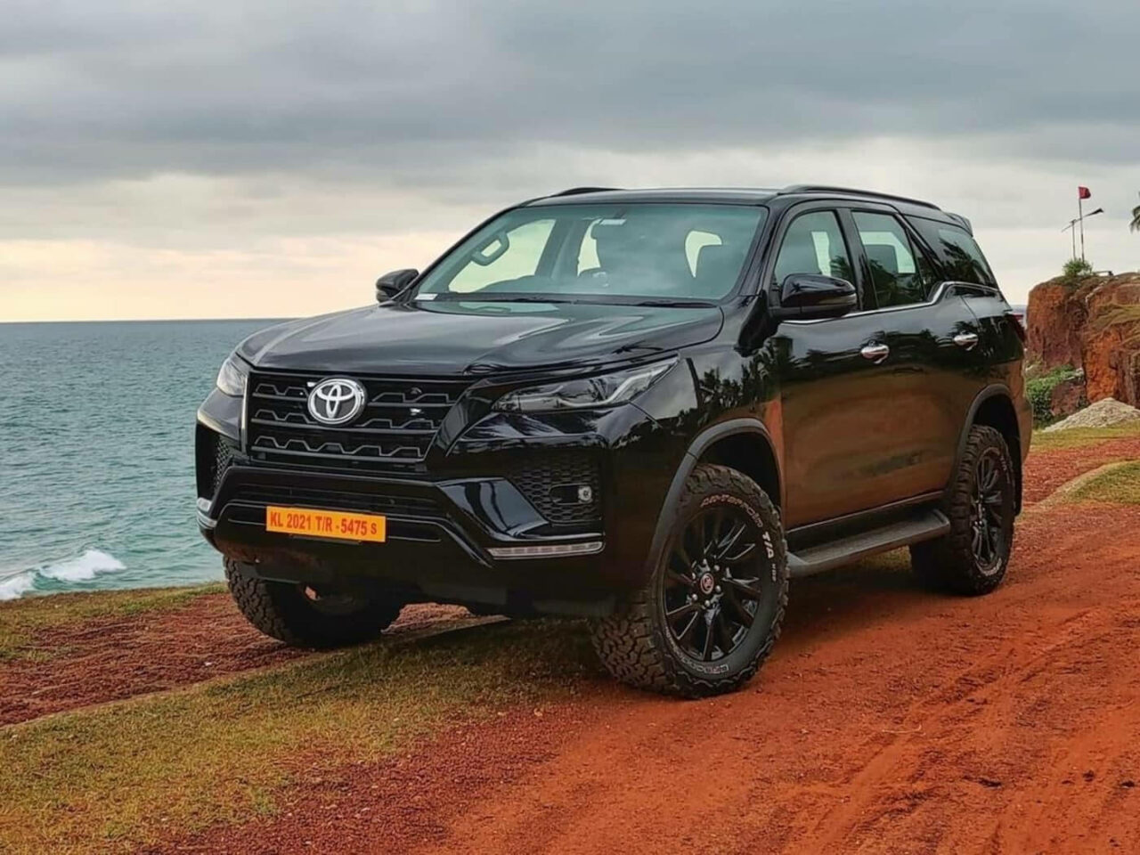 Black Toyota Fortuner SUV on Cliff Ocean View Wallpaper | Background ...