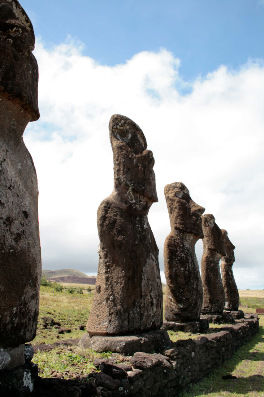 Majestic Moai Statues Under Clear Skies Wallpaper | Background FREE ...