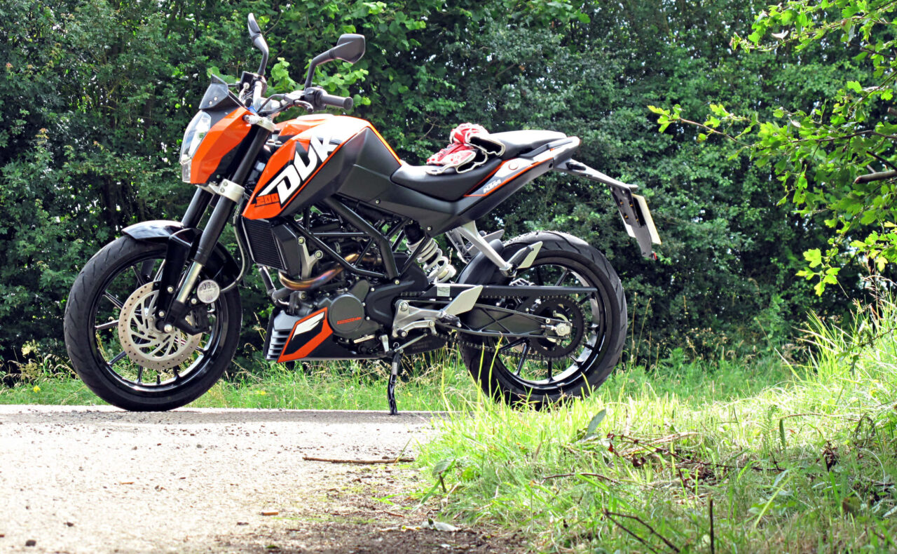 KTM Duke Motorcycle Thrill in Green Landscape Wallpaper | Background ...