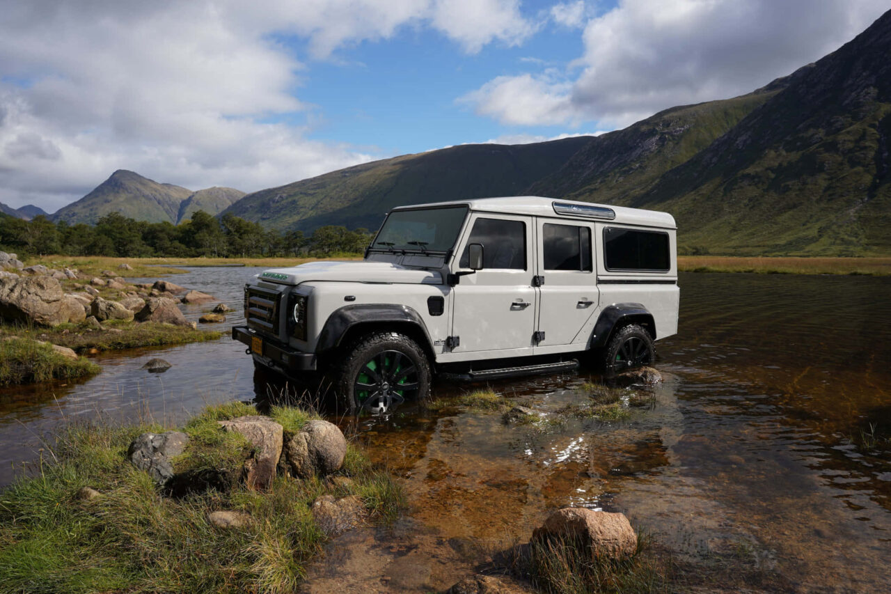 Defender Adventure Amidst Mountain Serenity Wallpaper | Background FREE ...