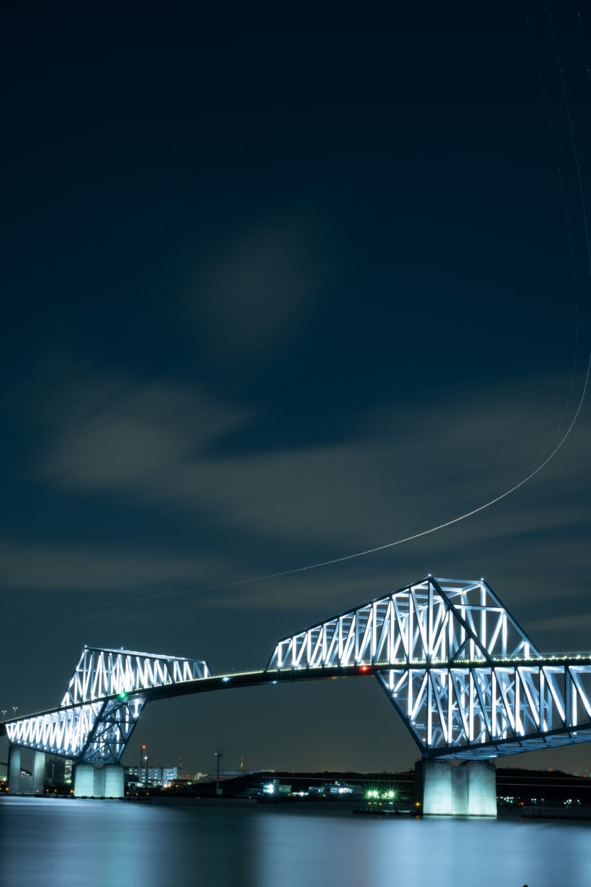 Illuminated Bridge Under Starry Night Wallpaper | Background FREE ...