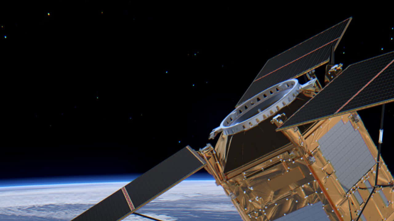 Solar-Powered Satellite Orbiting Earth Wallpaper | Background FREE ...