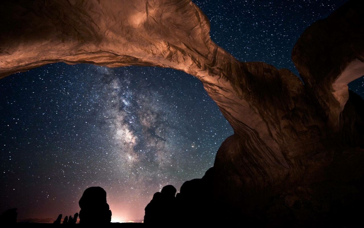 Starry Universe Over Majestic Arches Wallpaper | Background FREE ...