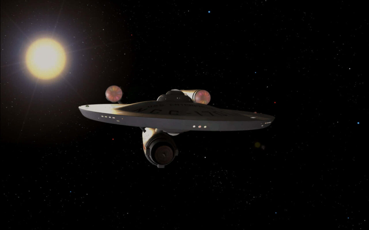 USS Enterprise Voyage Through Cosmic Wonder Wallpaper | Background FREE ...