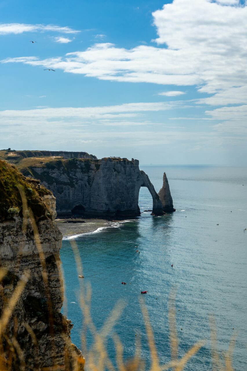 Sunlit Coastal Sea Arch with Turquoise Water Wallpaper | Background ...