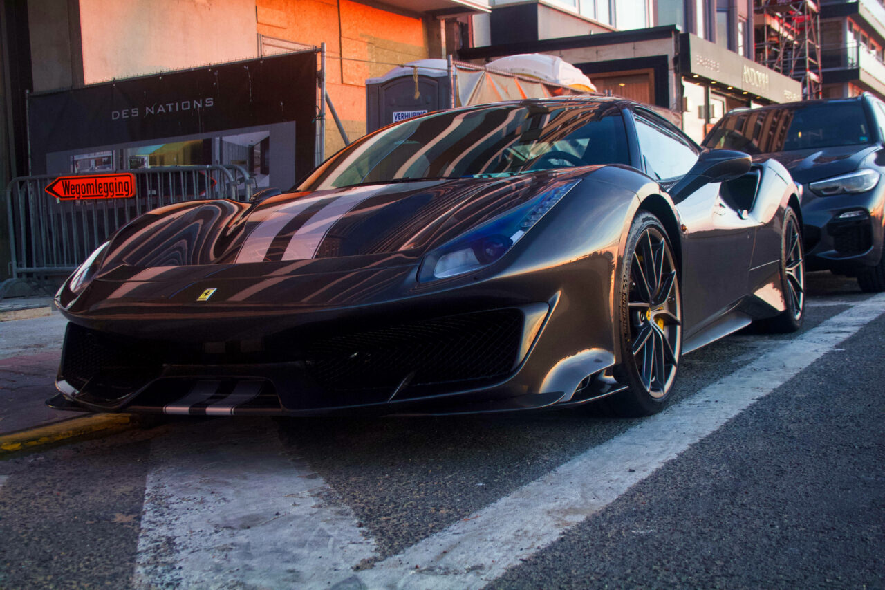 Luxurious Black Ferrari in Urban Wallpaper | Background FREE Download ...