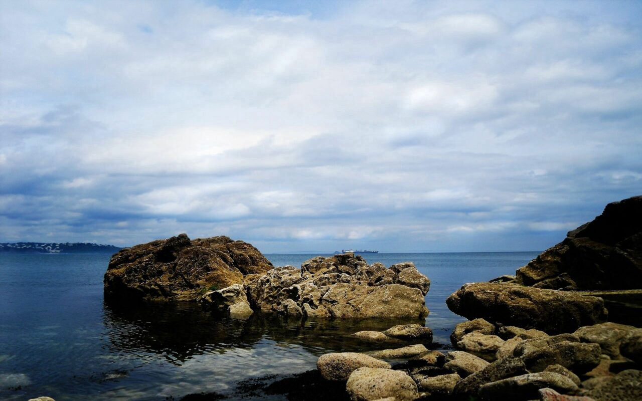Tranquil Coastal Rocks and Blue Sea Nature Wallpaper | Background FREE ...