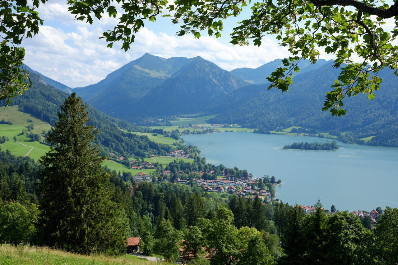 Tranquil Lakeside Village Mountain Landscape Wallpaper | Background ...