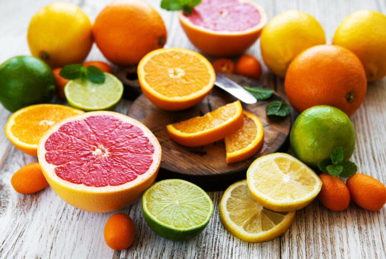Zesty Citrus Medley on Wooden Canvas Wallpaper | Background FREE ...