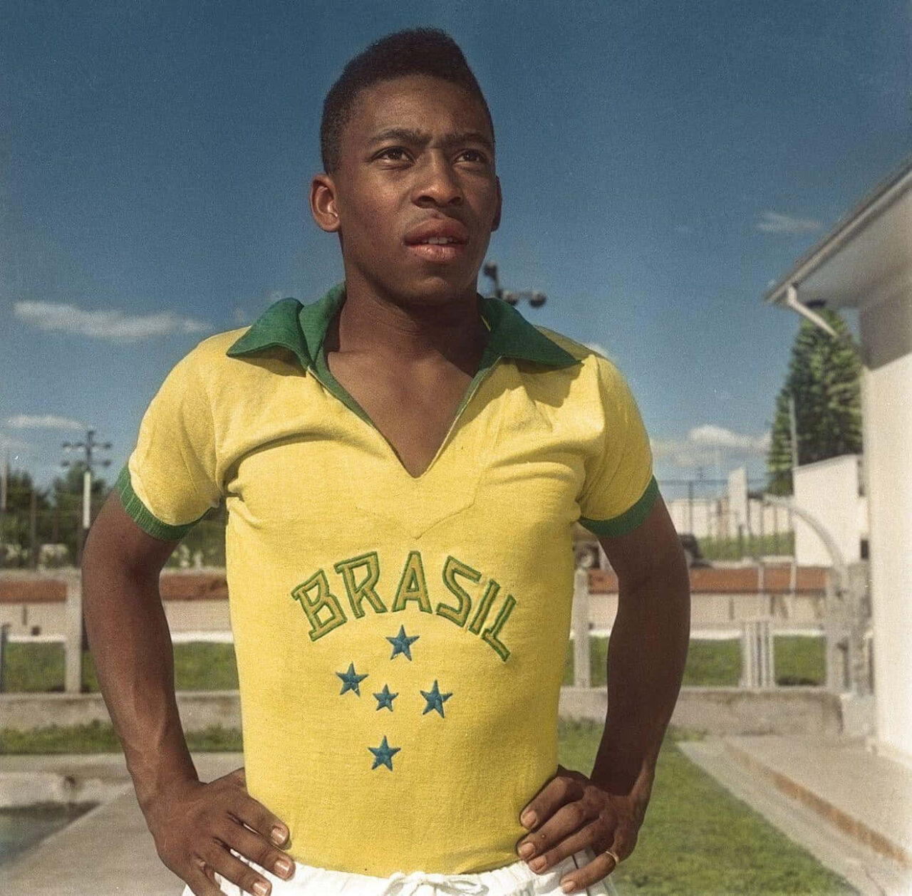 Pelé in Yellow Glory Celebrating Soccer Legacy Wallpaper | Background ...