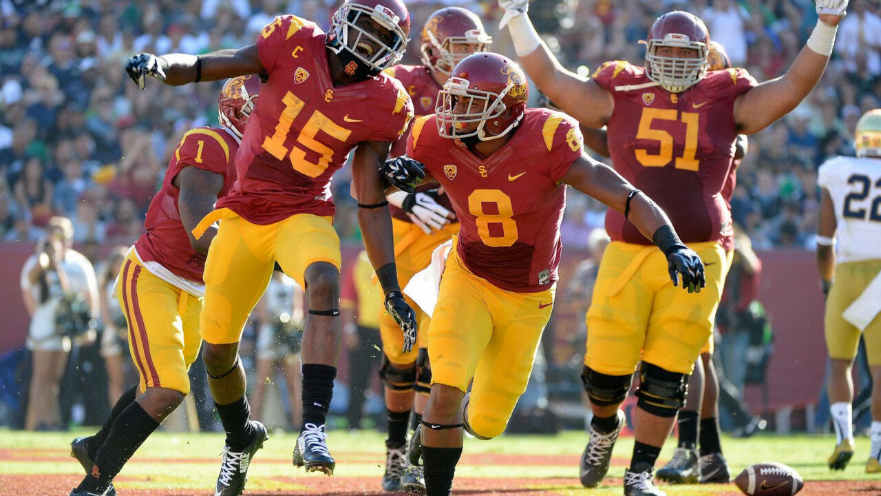 Team Spirit Ignited in USC Football Triumph Wallpaper | Background FREE ...