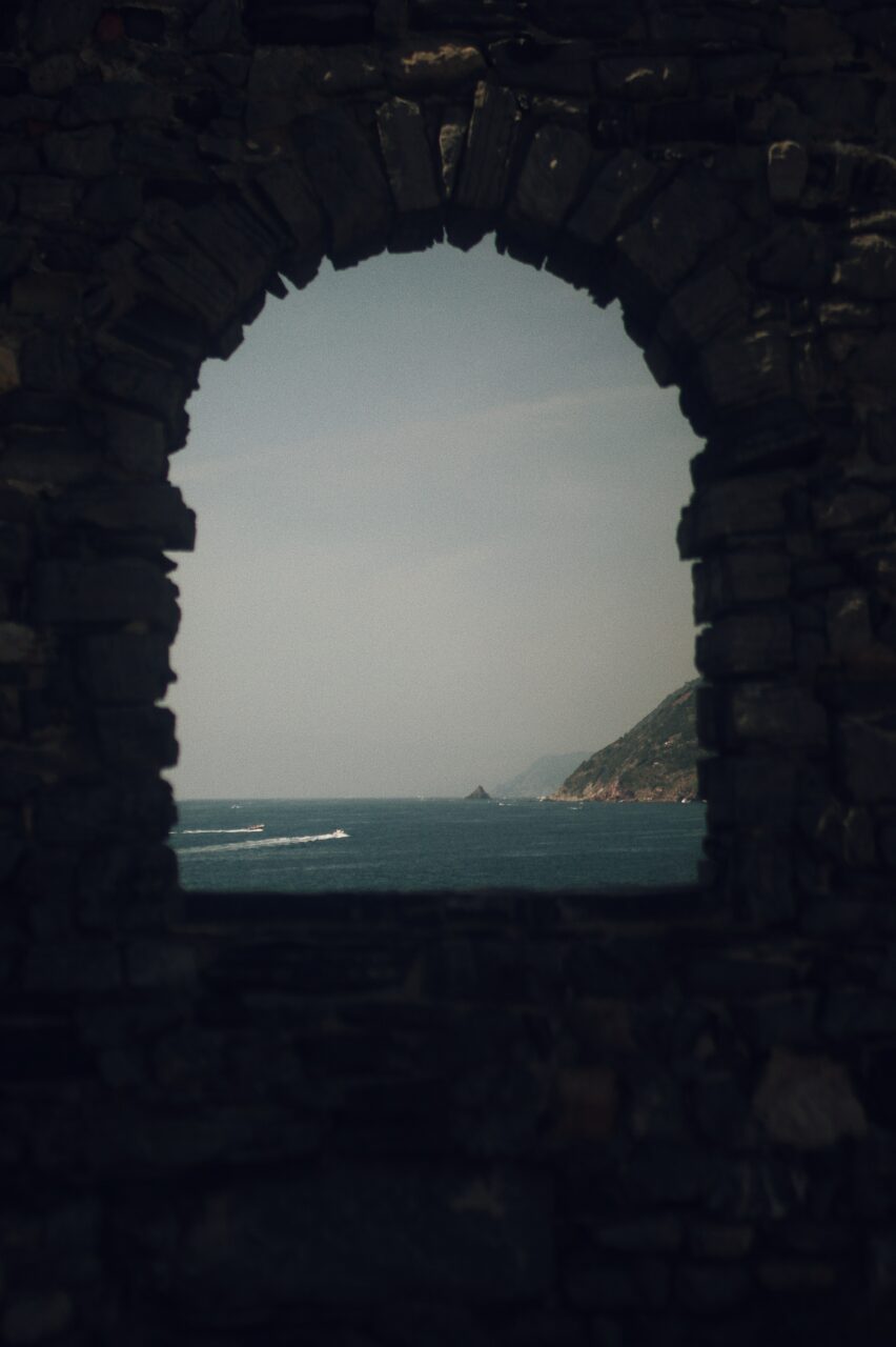 Rustic Stone Arch Over Serene Seascape Wallpaper | Background FREE ...