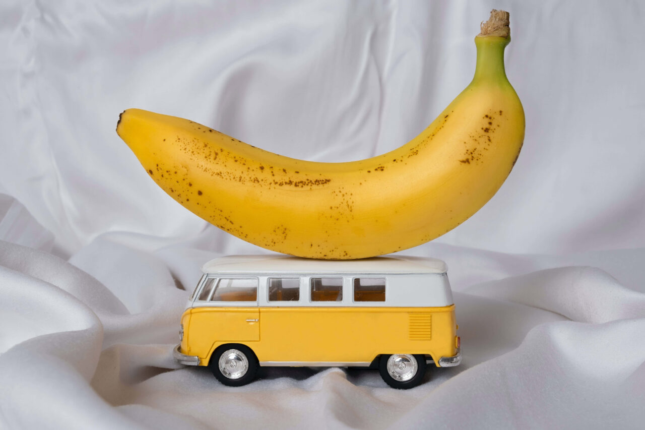 Yellow Banana on Toy Van Whimsical Sunny Scene Wallpaper | Background ...